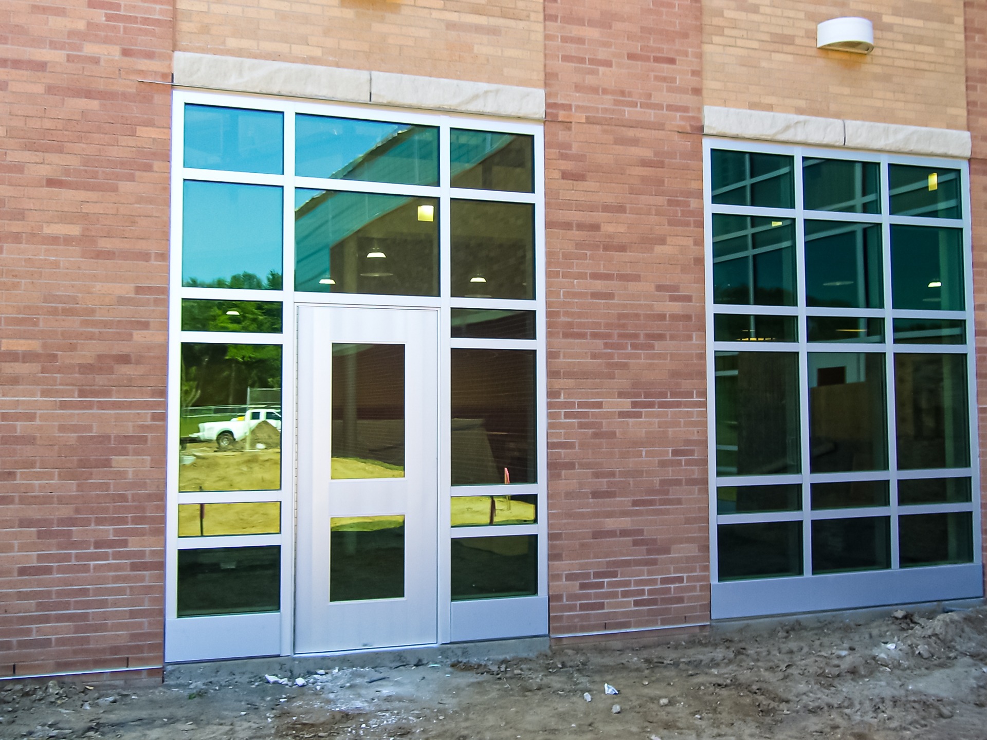 4 ½” Thermal Inside/Outside Storefront windows - Cross Aluminum